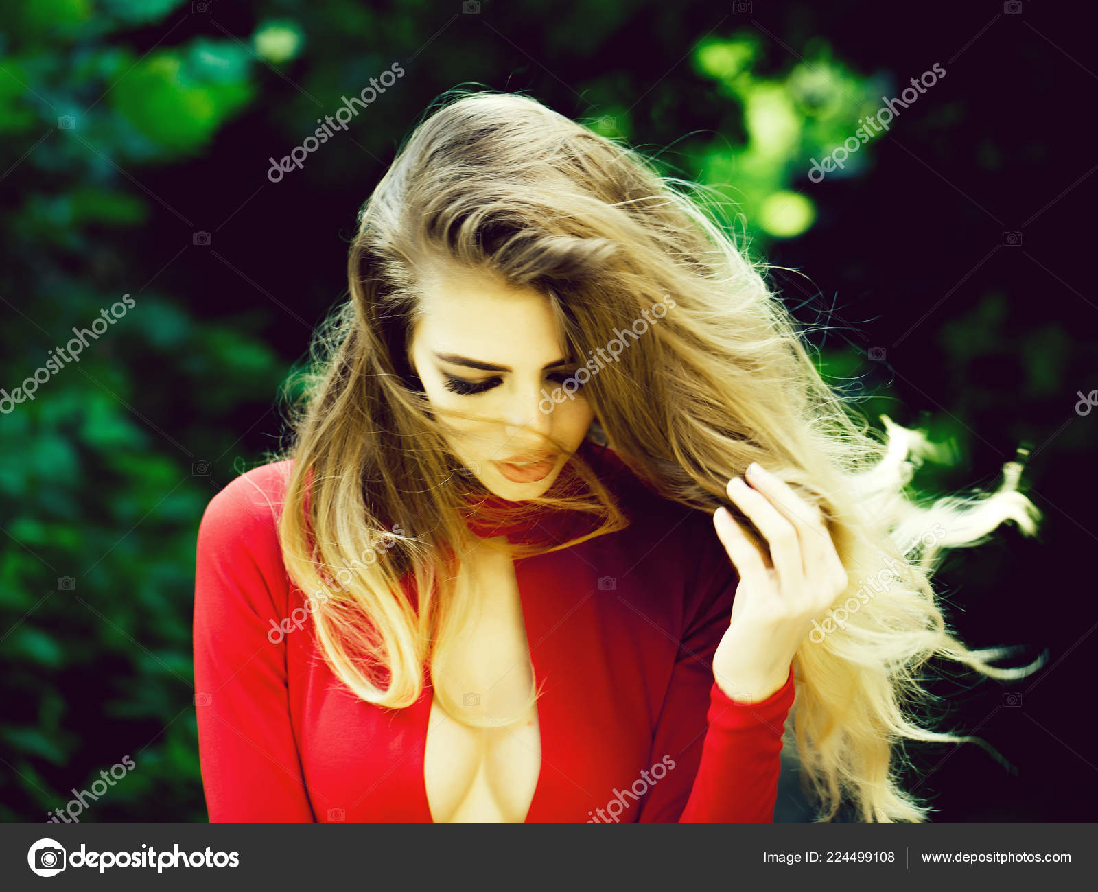 Sexy young woman with long hair — Stock Photo © Tverdohlib.com #224499108