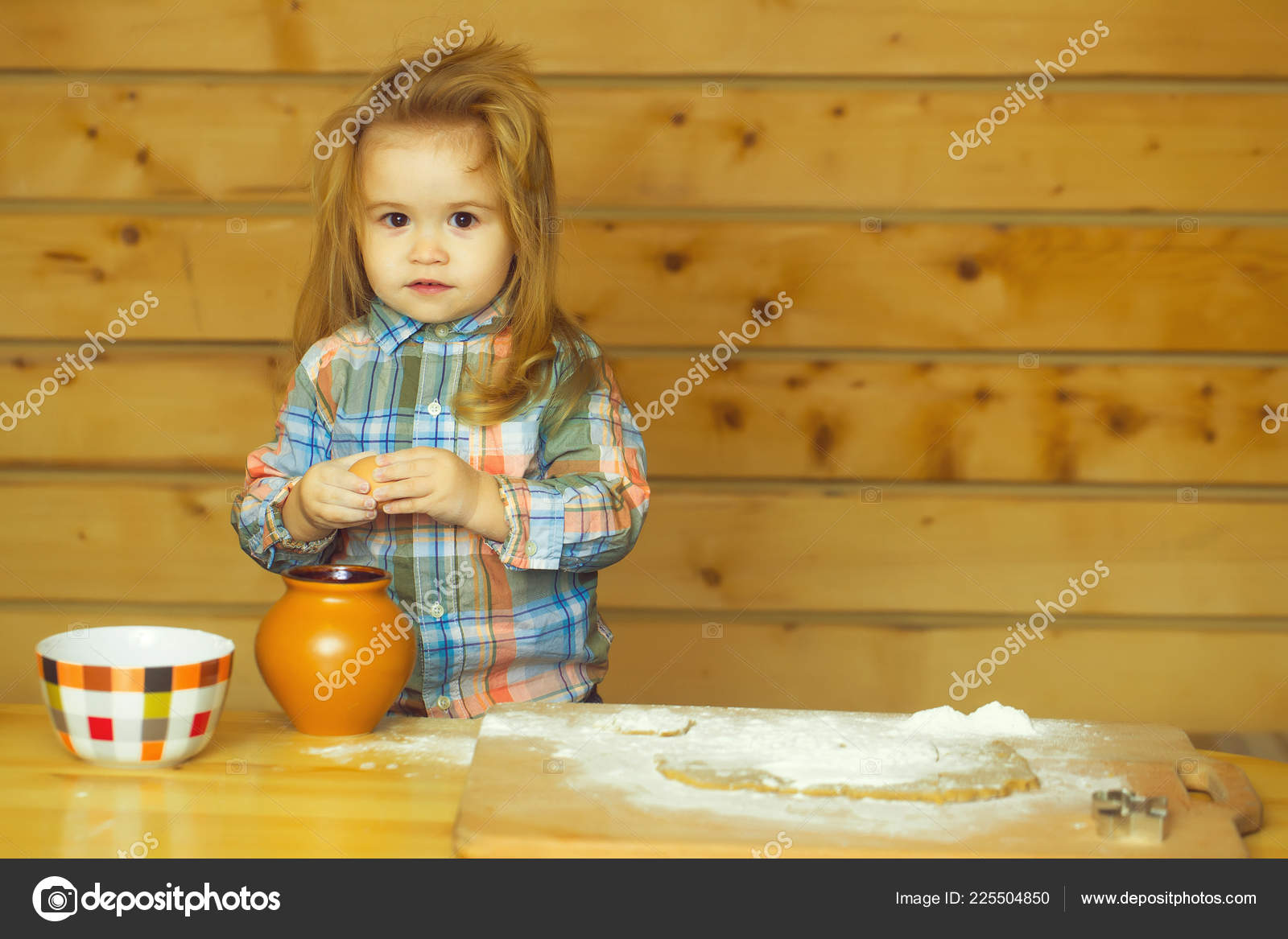 Cute child cooking with dough, flour, egg and bowl Stock Photo by ...