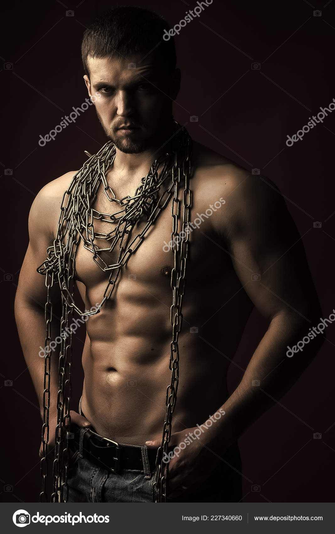 Muscular man with rope Stock Photo by ©Tverdohlib.com 227340660