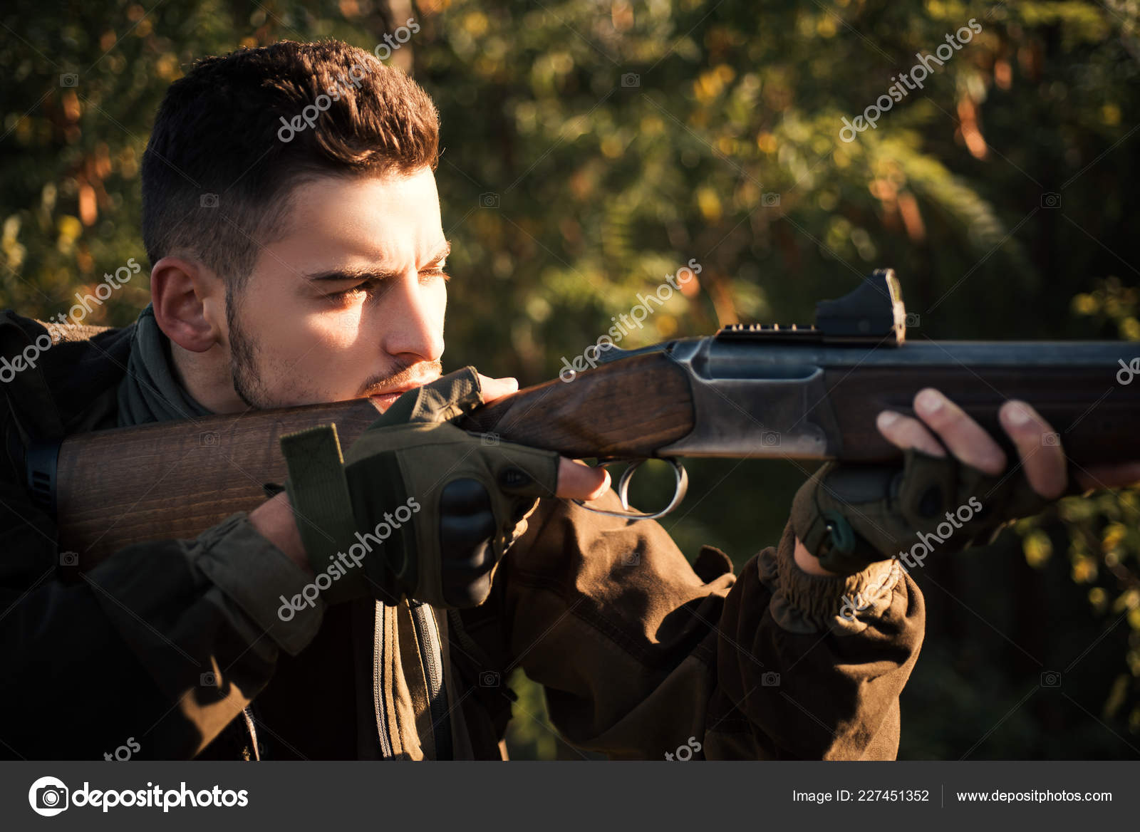 Hunter with shotgun gun on hunt. Hunter with Powerful Rifle with Scope ...