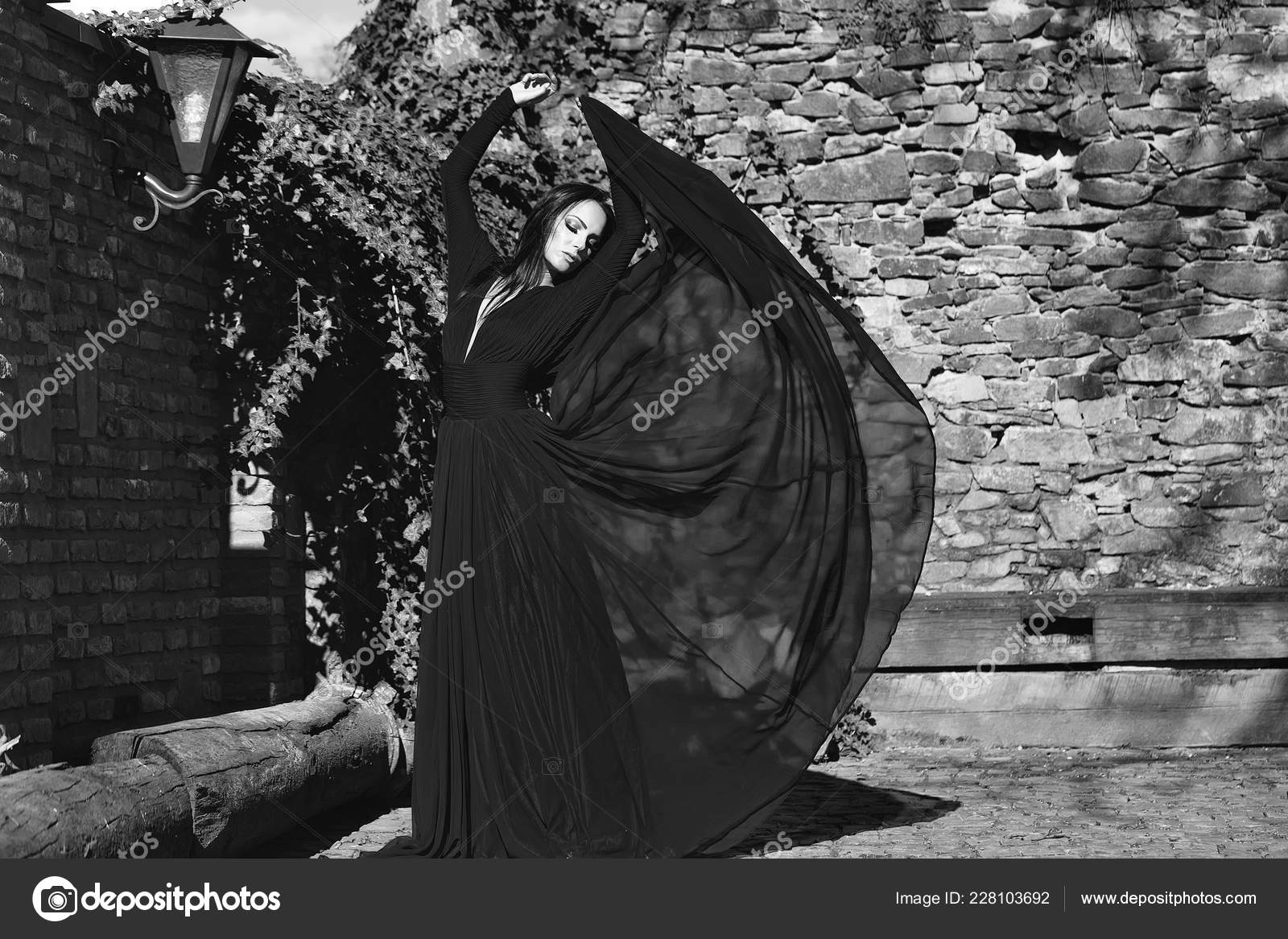 Woman in red dress outdoor Stock Photo by ©Tverdohlib.com 228103692