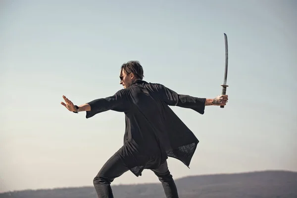 Man dragging sword Stock Photos, Royalty Free Man dragging sword Images ...