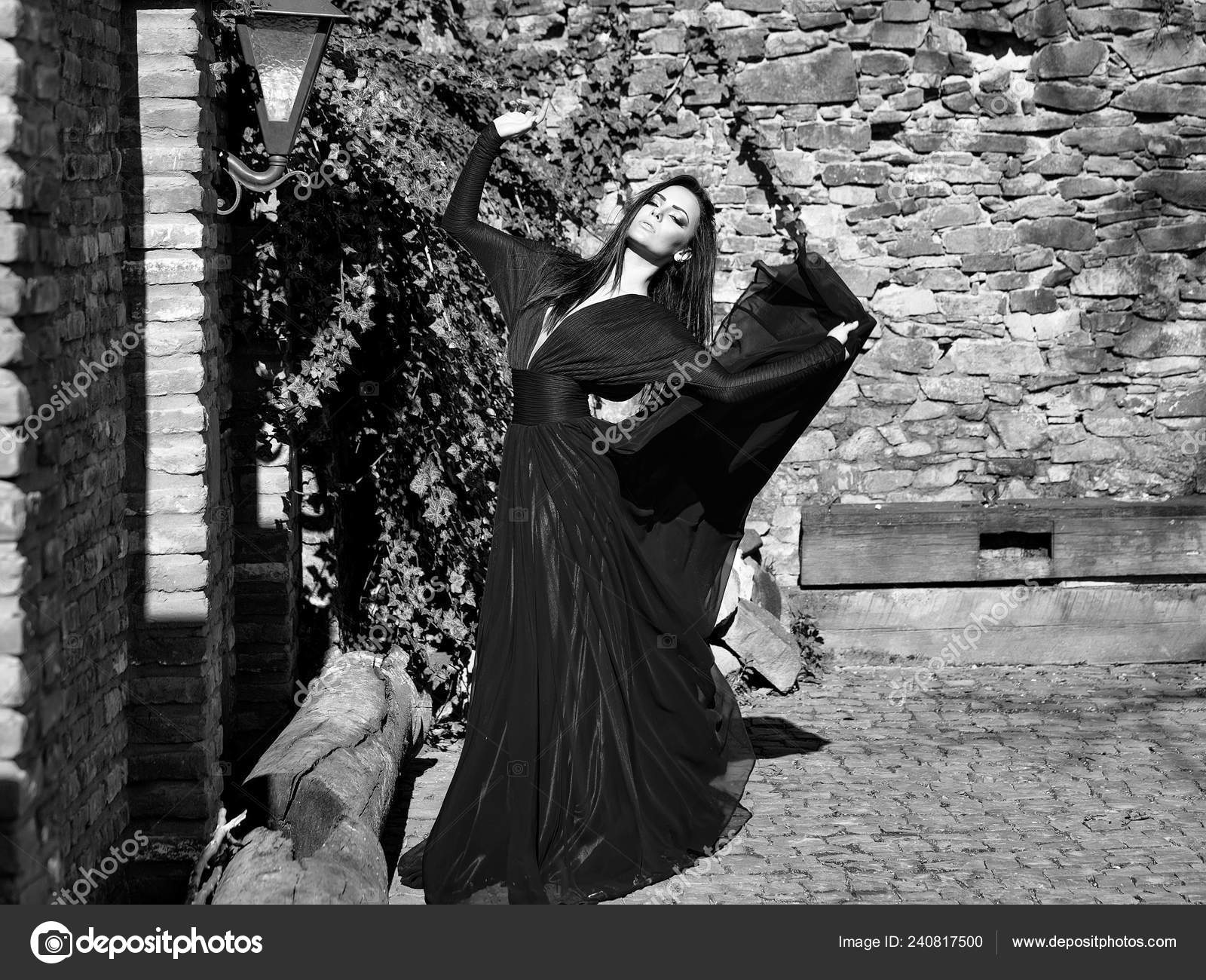 Woman in red dress outdoor — Stock Photo © Tverdohlib.com #240817500