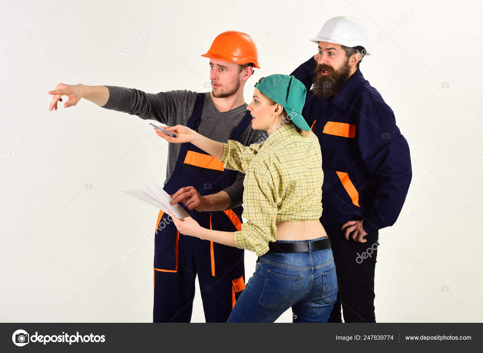 Teamwork is a key to success. Group of constructing engineers and ...