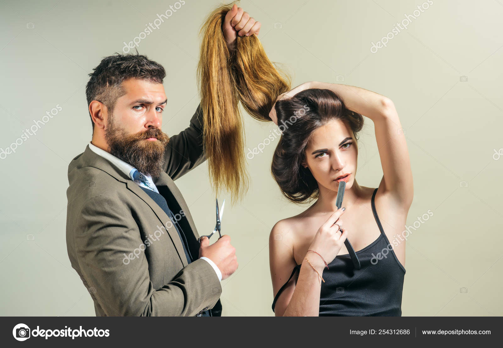 Beard styling and cut. Making haircut look perfect in barber shop ...