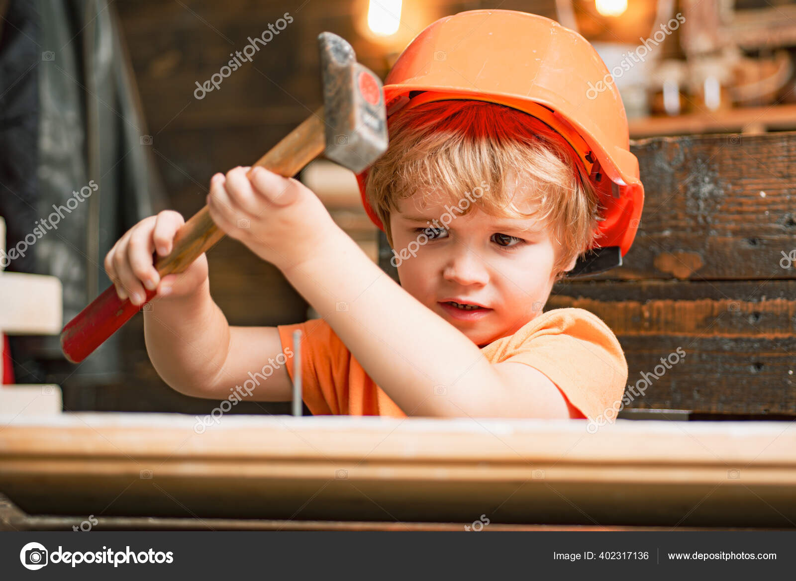Child deals in helmet is construction Foreman