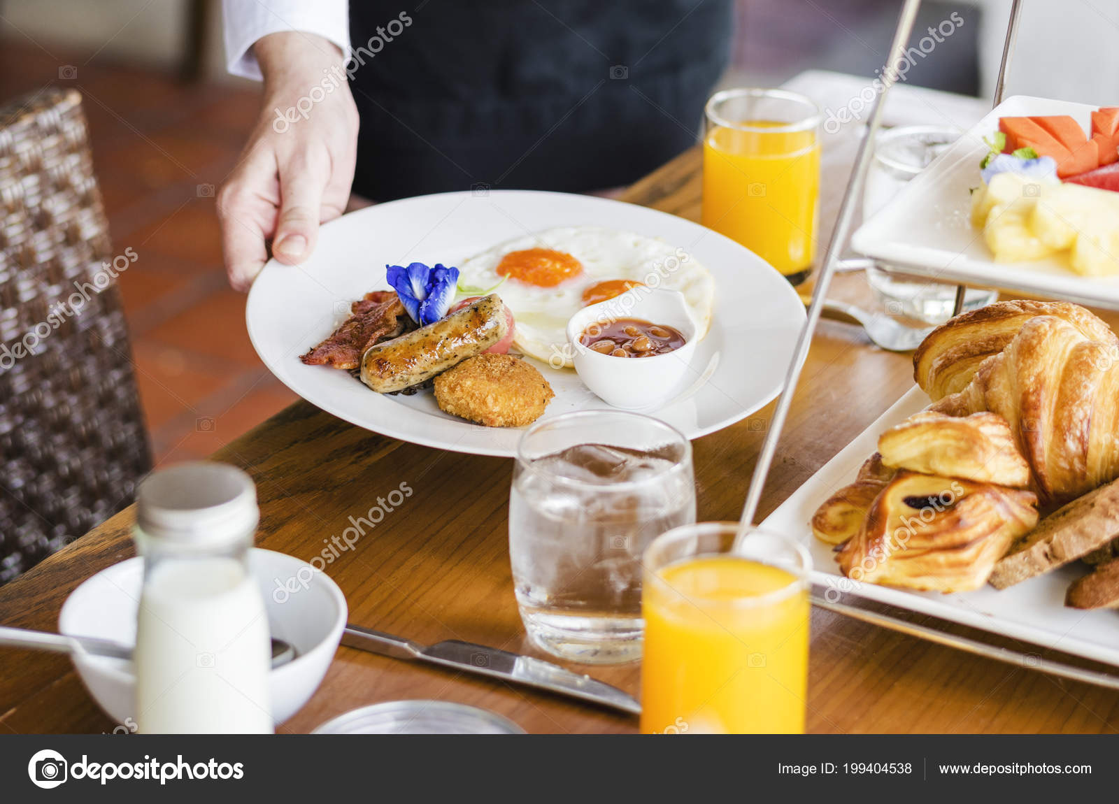 Waitress Serving Breakfast
