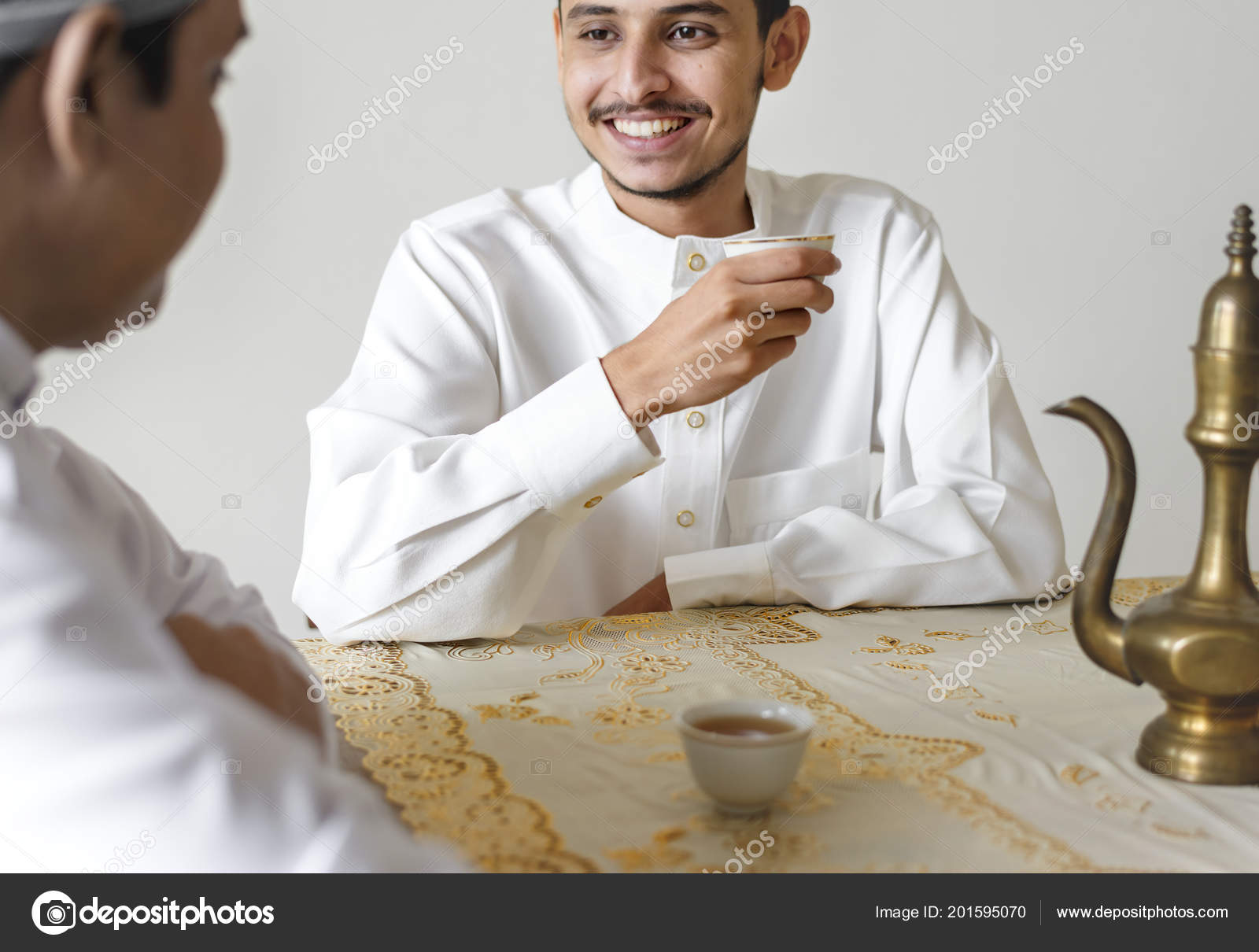 Muslim Men Having Cup Tea — Stock Photo © Rawpixel #201595070