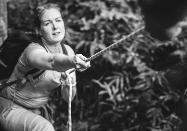 Woman Climbing Rope — Stock Photo © Rawpixel #195914916