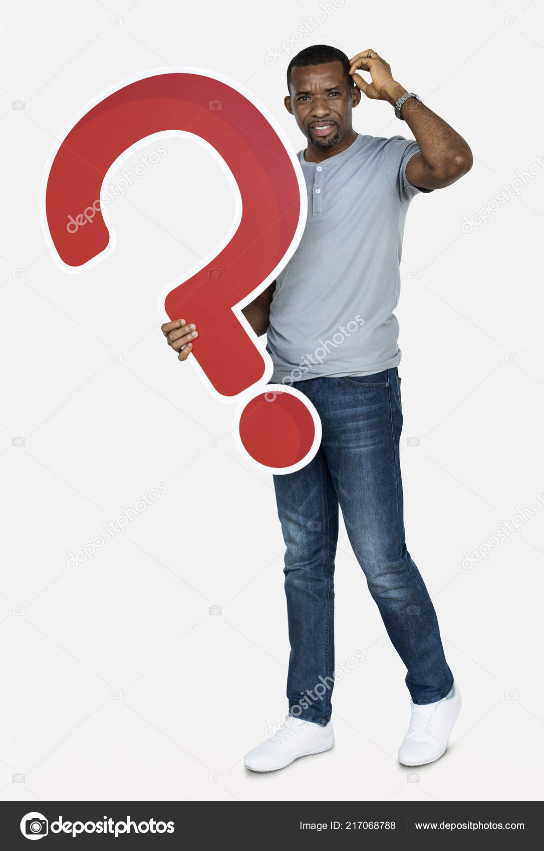 Confused Man Holding Question Mark Icon Stock Photo by ©Rawpixel 217068788