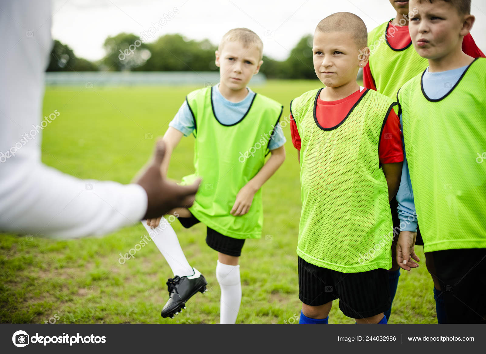 Football Coach Instructing His Students — Stock Photo © Rawpixel #244032986