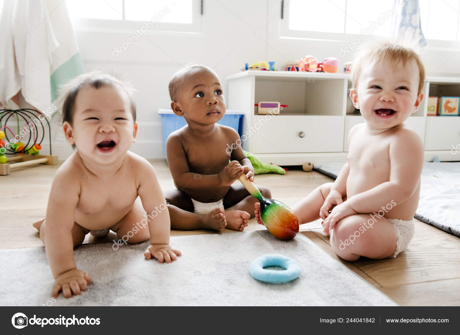 Diverse Babies Playing Together