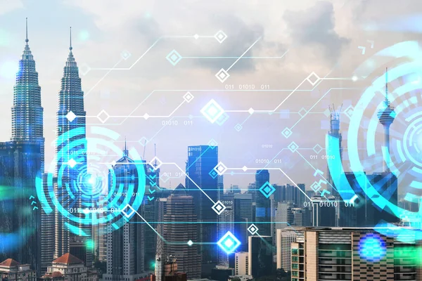 Technology hologram over panorama city view of Kuala Lumpur. KL is the ...