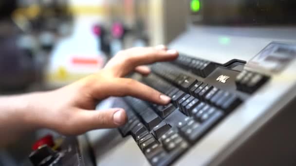 A factory worker is programing or controlling cnc machine ⬇ Video by ...