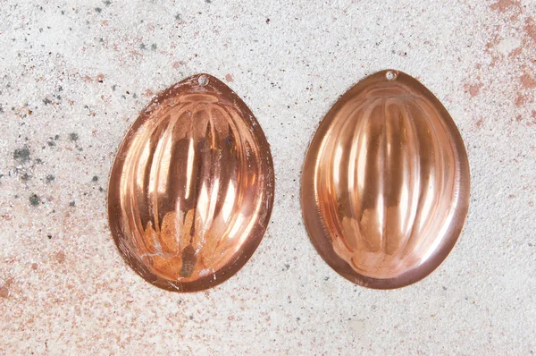 Vintage copper cookie molds on a concrete background. Copy space for ...
