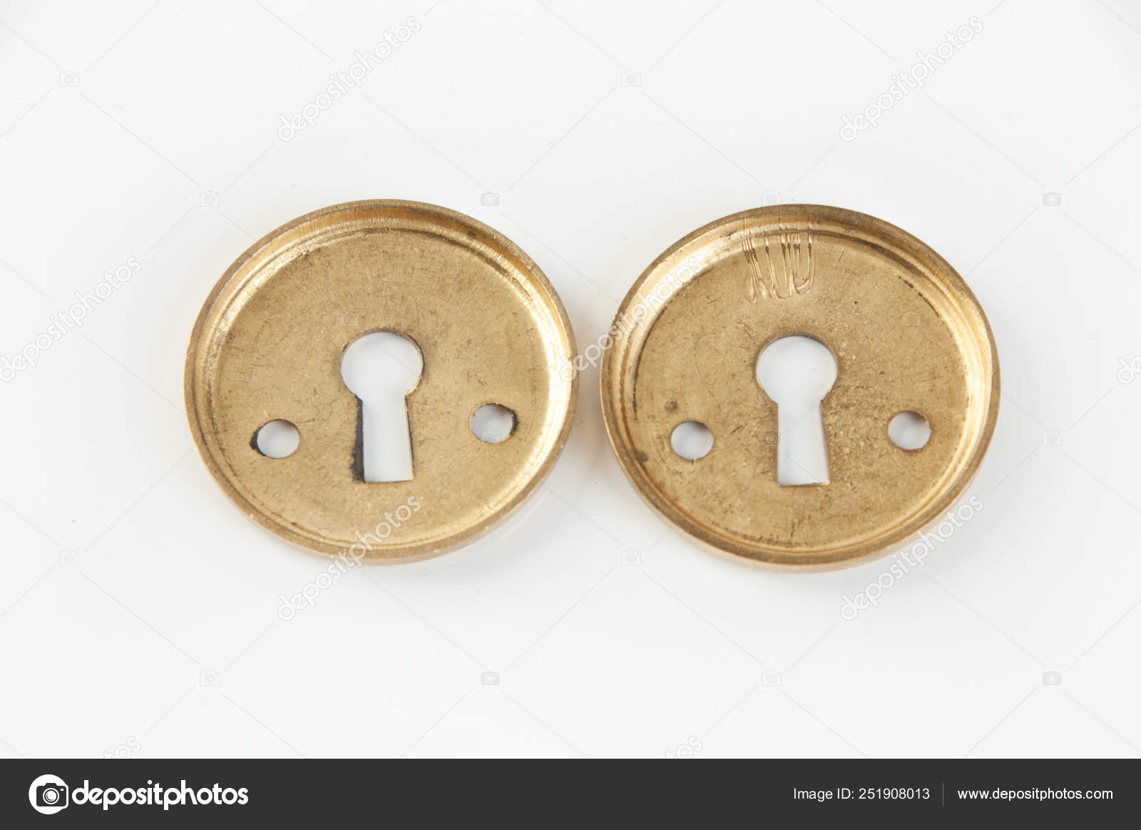 Vintage brass keyhole lock covers Stock Photo by ©voisine 251908013