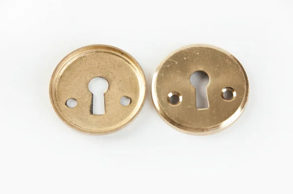 Vintage brass keyhole lock covers Stock Photo by ©voisine 251908013