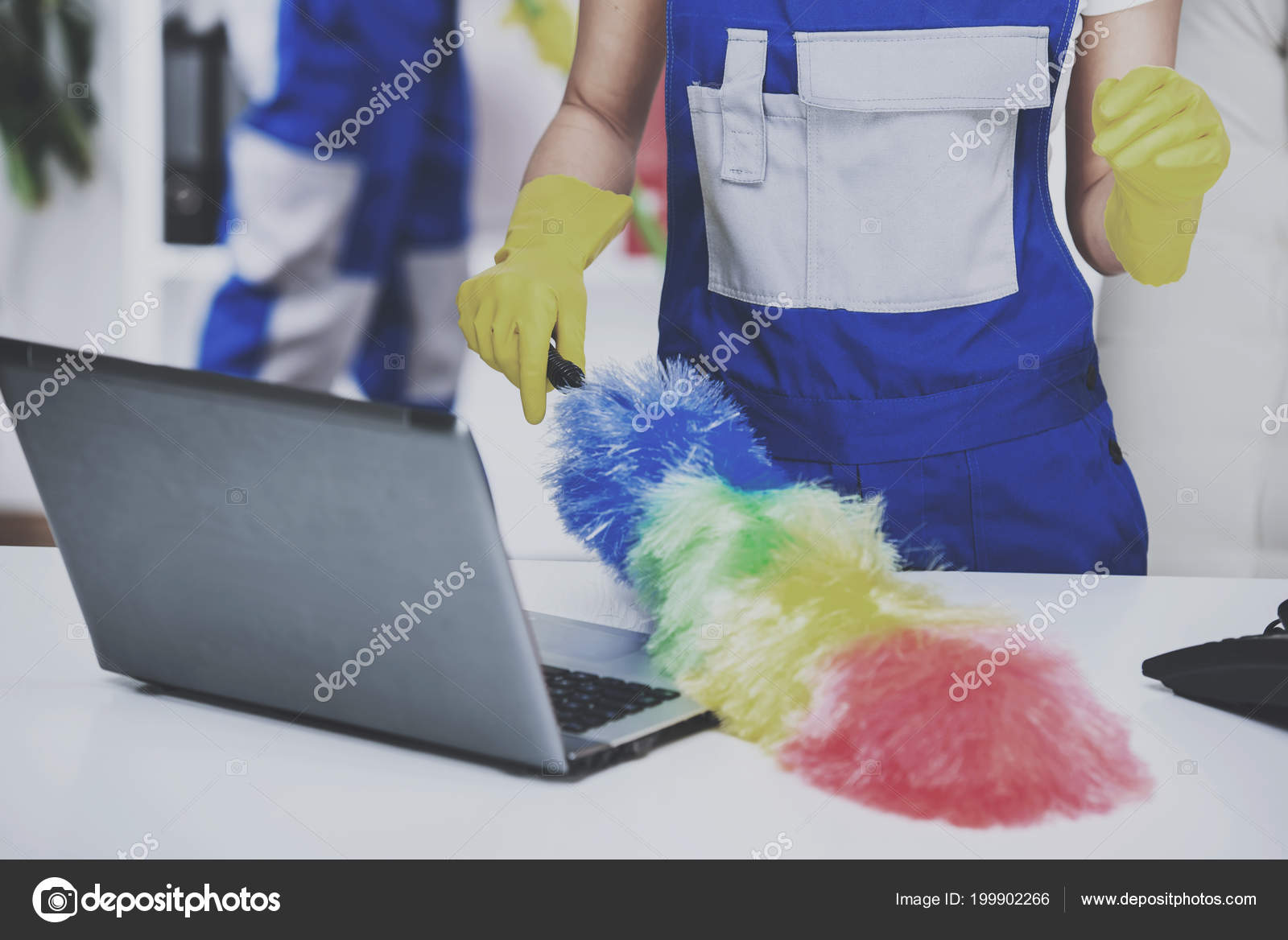 Woman cleaning computer with brush in office. — Stock Photo ...