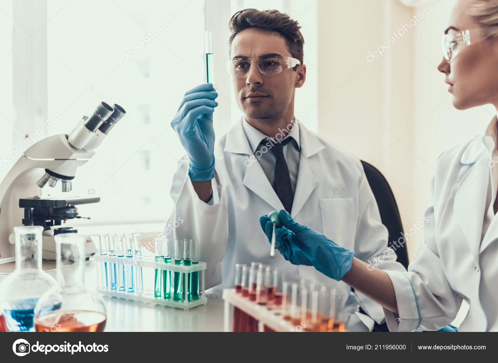 Young Scientists Examining Samples Laboratory Researchers Wearing White ...