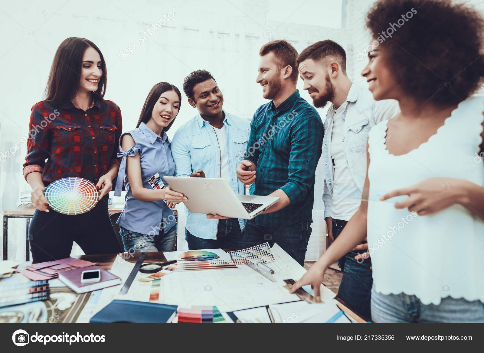 Different Races Of People Working Together