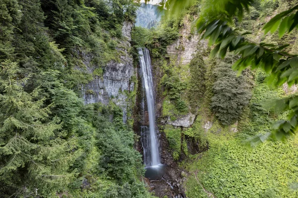 High waterfall among dense forests Maral waterfall. Maral Waterfall ...