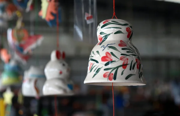 Ceramic mobile hanging at the miscellaneous shop, a decoration made of ...