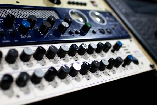 professional audio mixer and amplifier with different knobs for adjusting effects and volumes ...