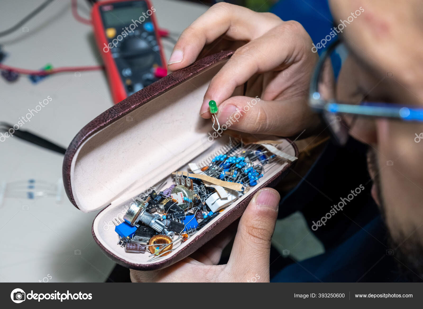 Guy Holding Electronic Parts His Hand — Stock Photo © dieasaob #393250600