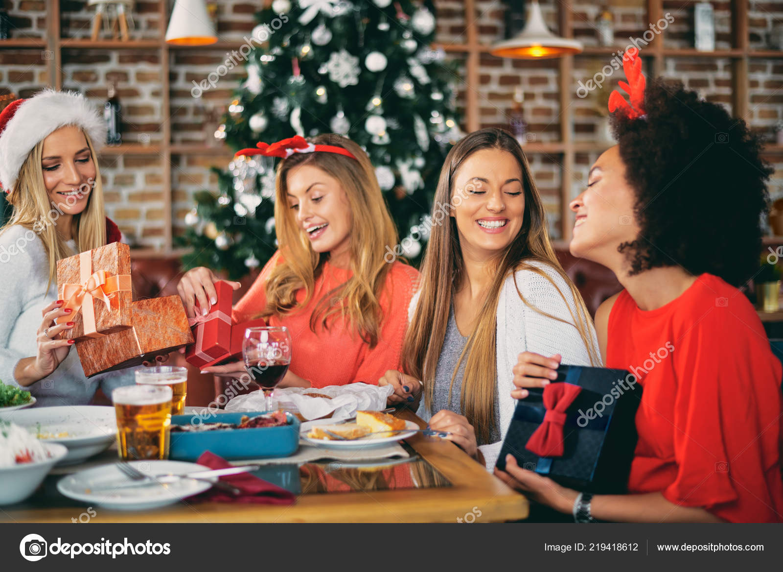 People Giving Gifts To Each Other