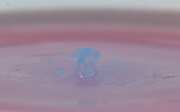 Ink droplets slow motion Stock Photos, Royalty Free Ink droplets slow ...