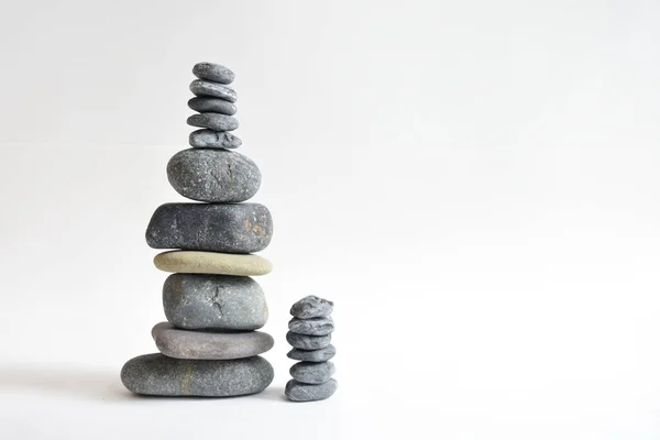 Stack stones isolated in white background. Pebbles tower. Concept of ...