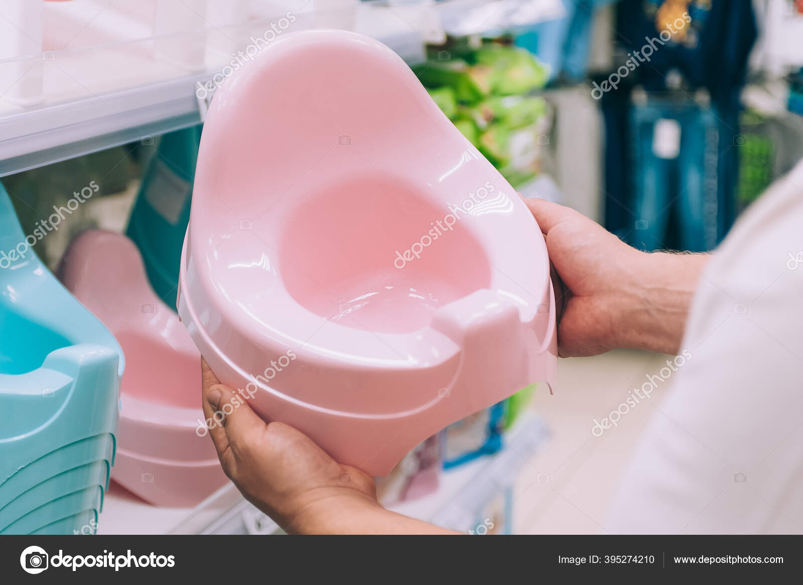 Guy Chooses Potty Baby Store Stock Photo by ©cherevkostock2020.gmail ...