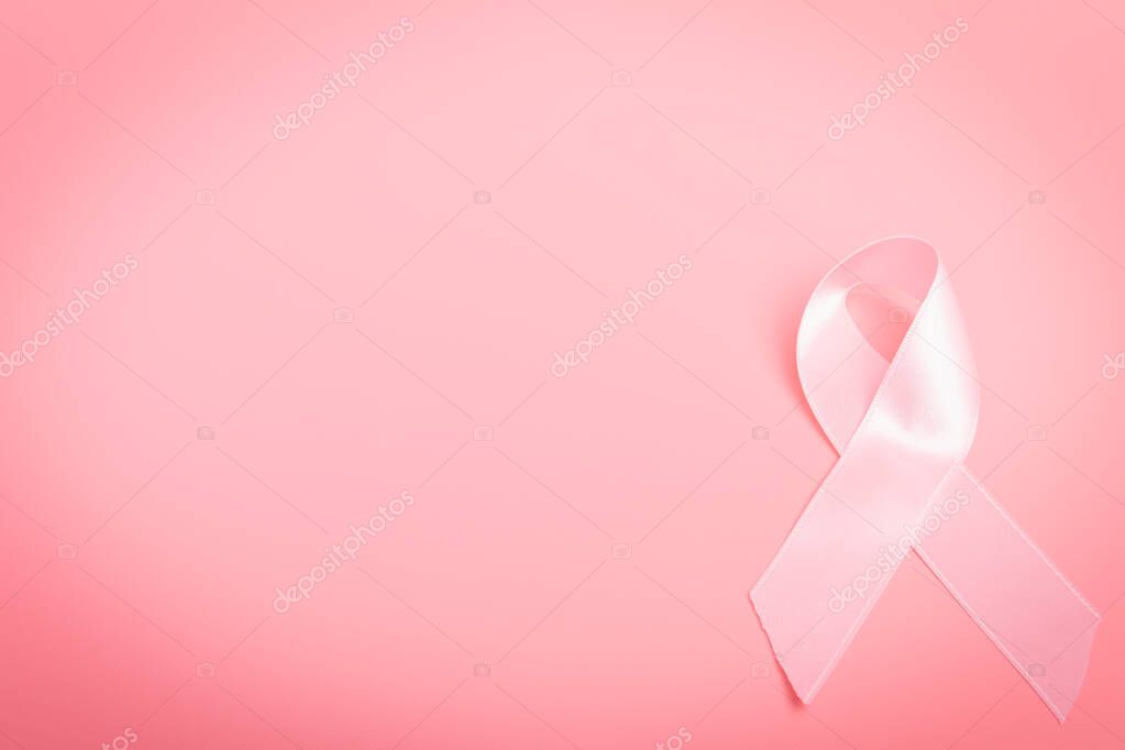 Arco rosa sobre fondo rosa. El lazo es un símbolo universal de la ...