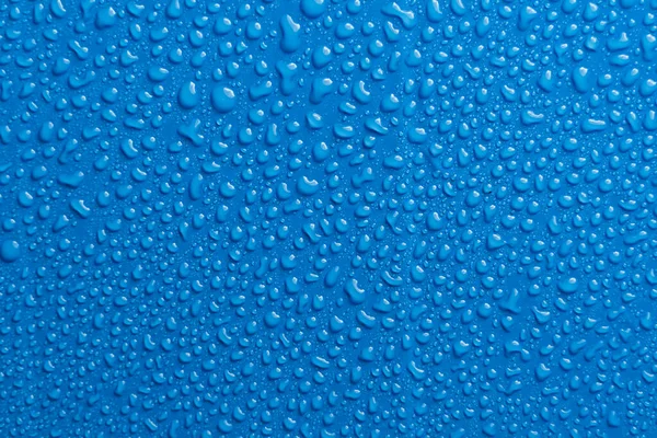 Abstract Water Drops Blue Background — Stock Photo © Suprachai #405135154