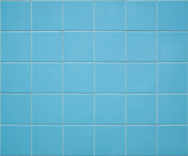 Light blue tiled wall background with square tiles - Stock Image ...