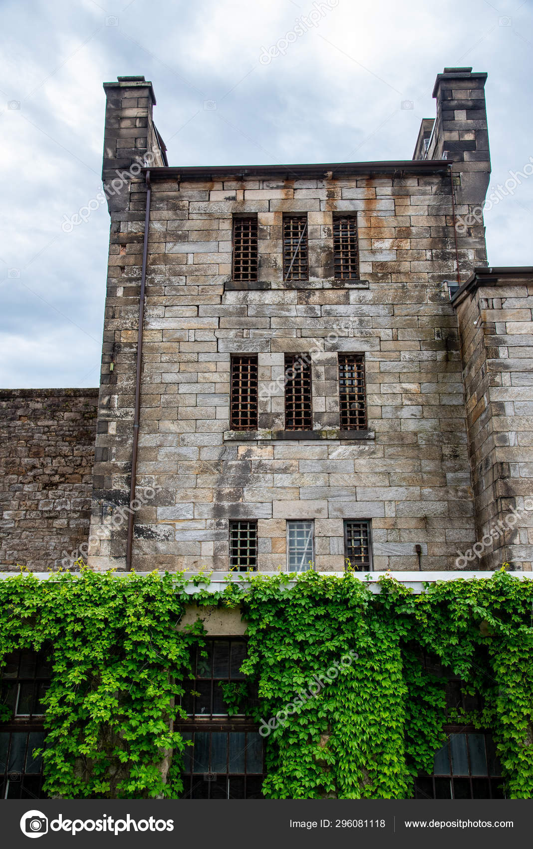 Windows with bars in a penitentiary — Stock Photo © rmbarricarte #296081118