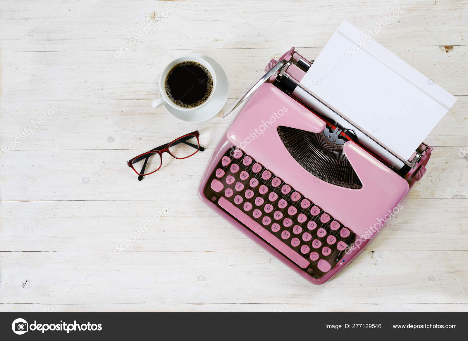 Pink Typewriter With Paper
