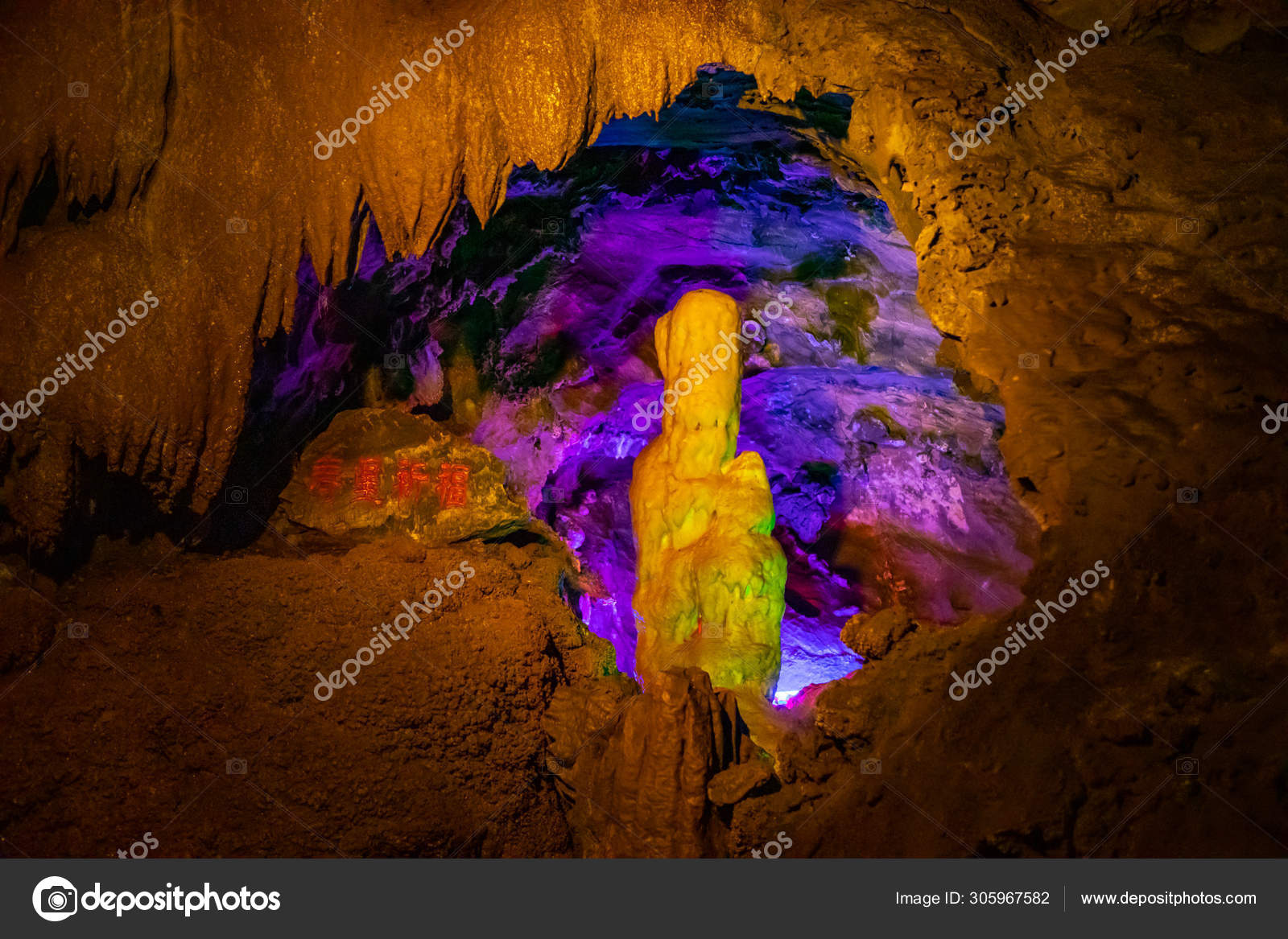 Beautiful illuminated multicolored stalactites in Danzhou Stone Flower ...