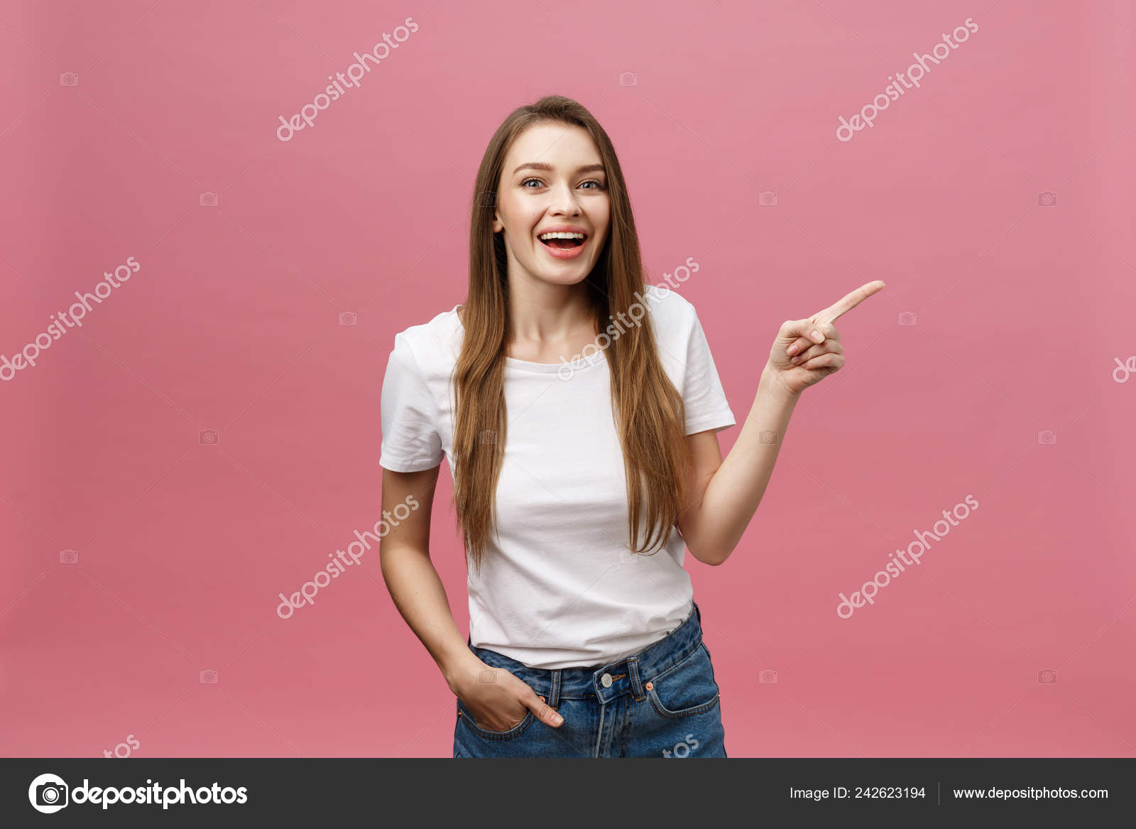 Woman pointing finger at camera and toothy smiling. Expression emotion ...