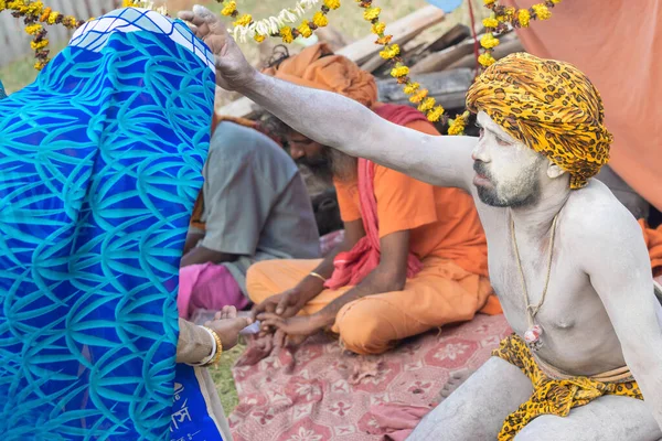 Baba neem karoli raised his hand in the air giving reassurance and ...