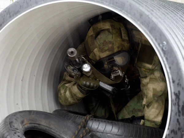 Special Forces soldiers overcome obstacles - Stock Image - Everypixel