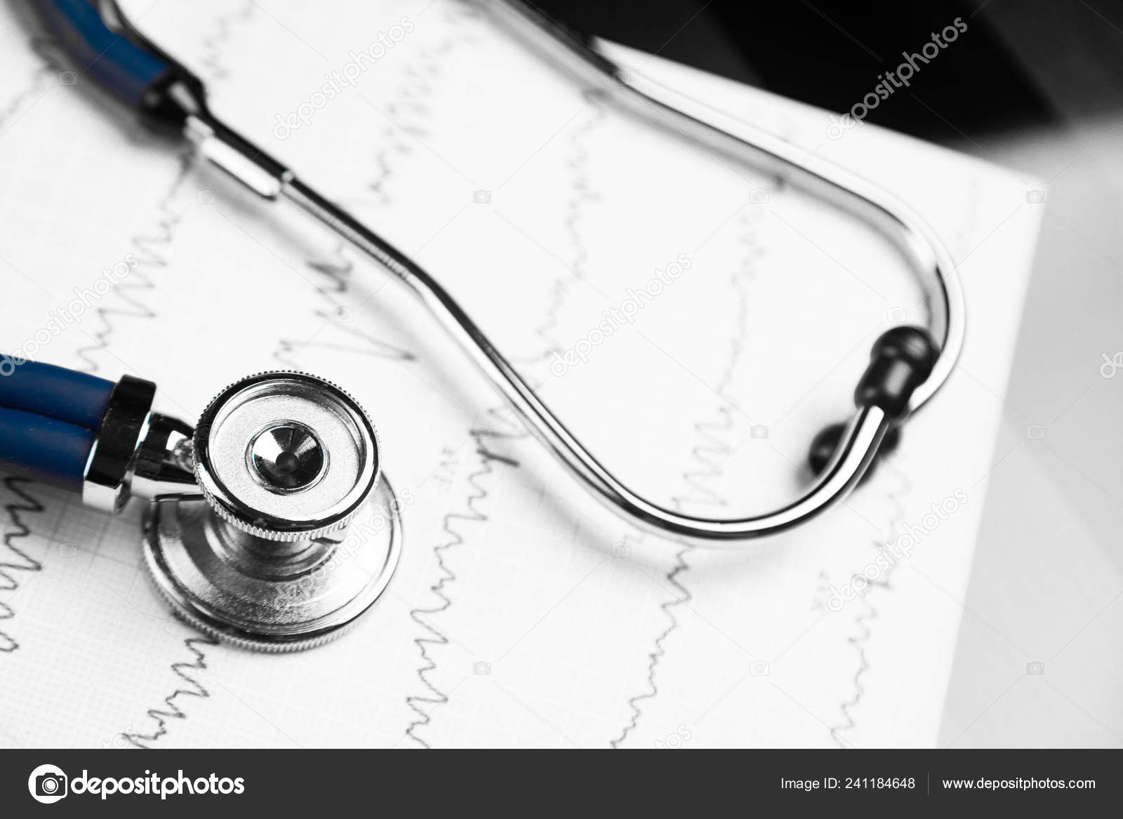 Stethoscope lying on a sheet with an electrocardiogram — Stock Photo ...