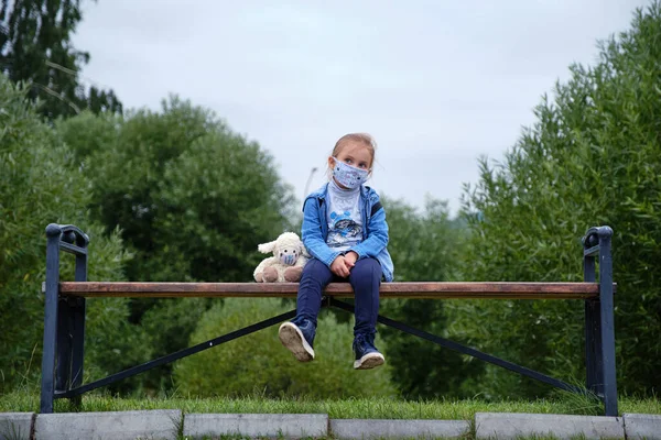 Little Girl Mask Stands Tree Her Toy Mask Stock Photo by ©Aleksander.D ...