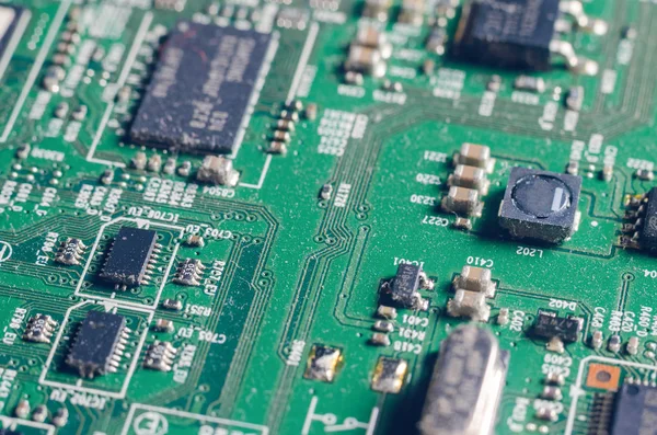 A thick layer of dust covers the internal electronic components of the ...