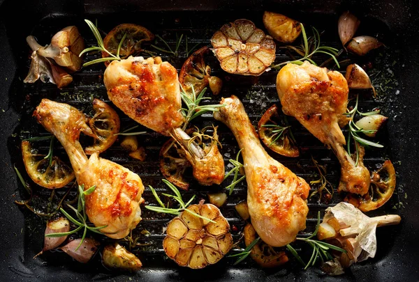 Grilled chicken. Grilled chicken legs, drumsticks with addition, garlic ...