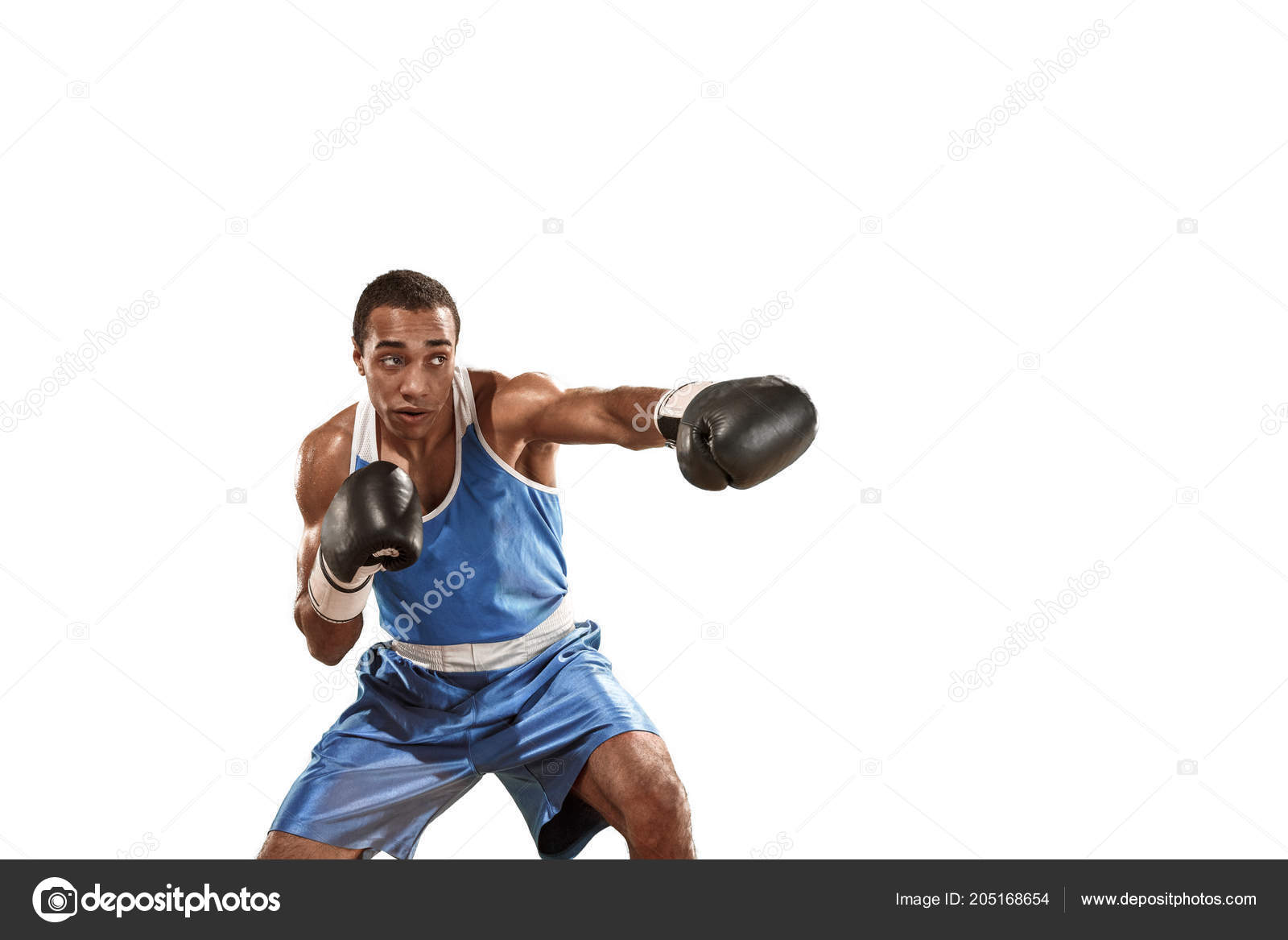 Sporty man during boxing exercise. Photo of boxer on white background ...