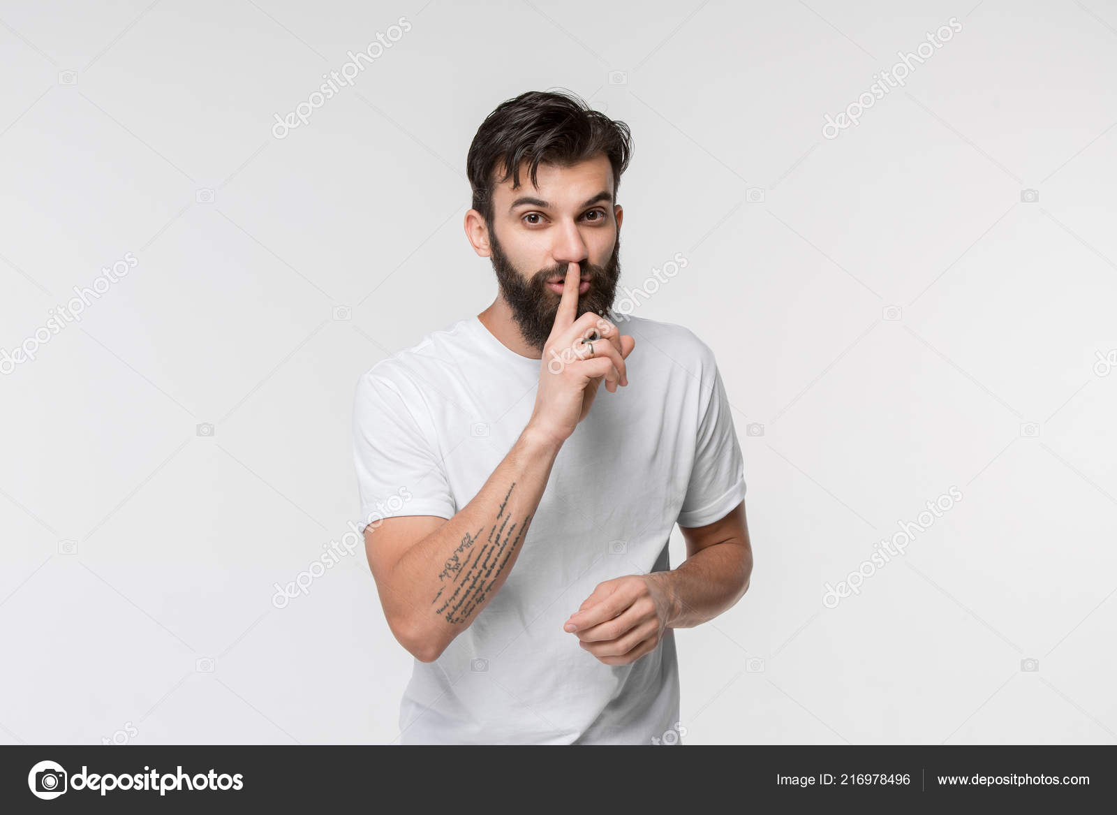 The young man whispering a secret behind her hand Stock Photo by ...