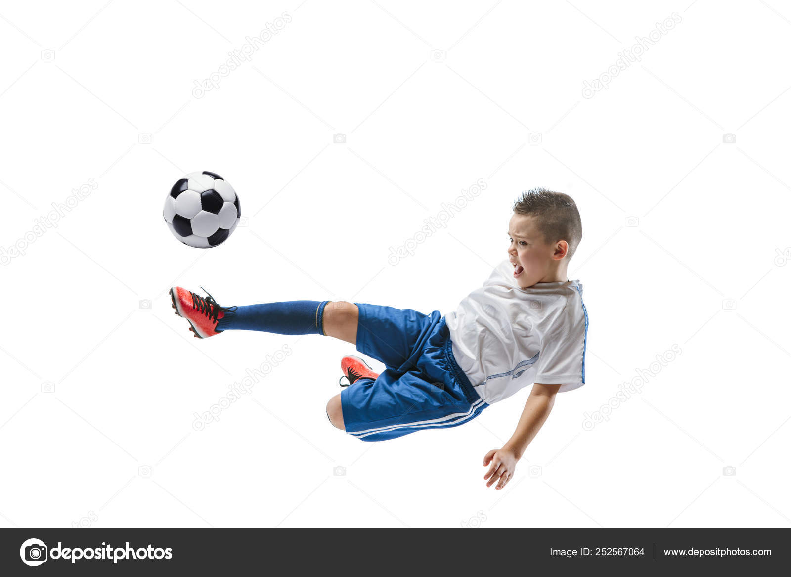 Young boy kicks the soccer ball Stock Photo by ©vova130555@gmail.com ...