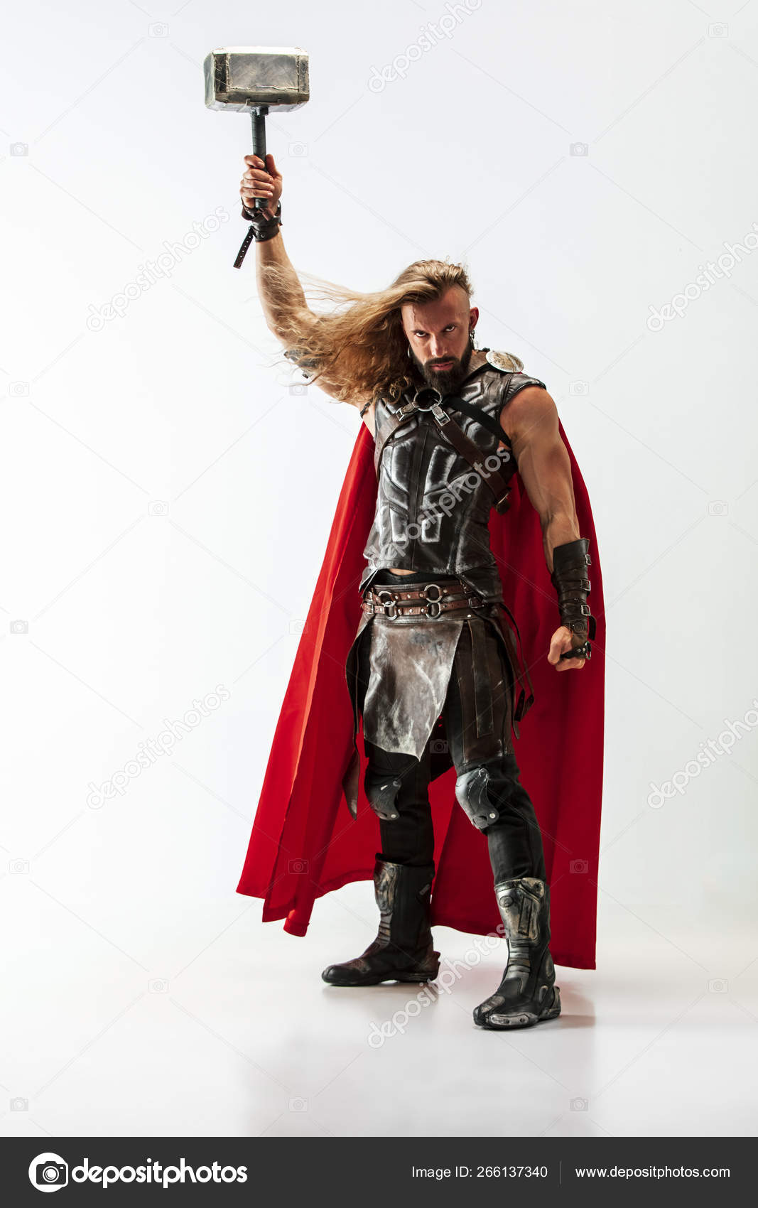Man in cosplaying Thor isolated on white studio background Stock Photo ...