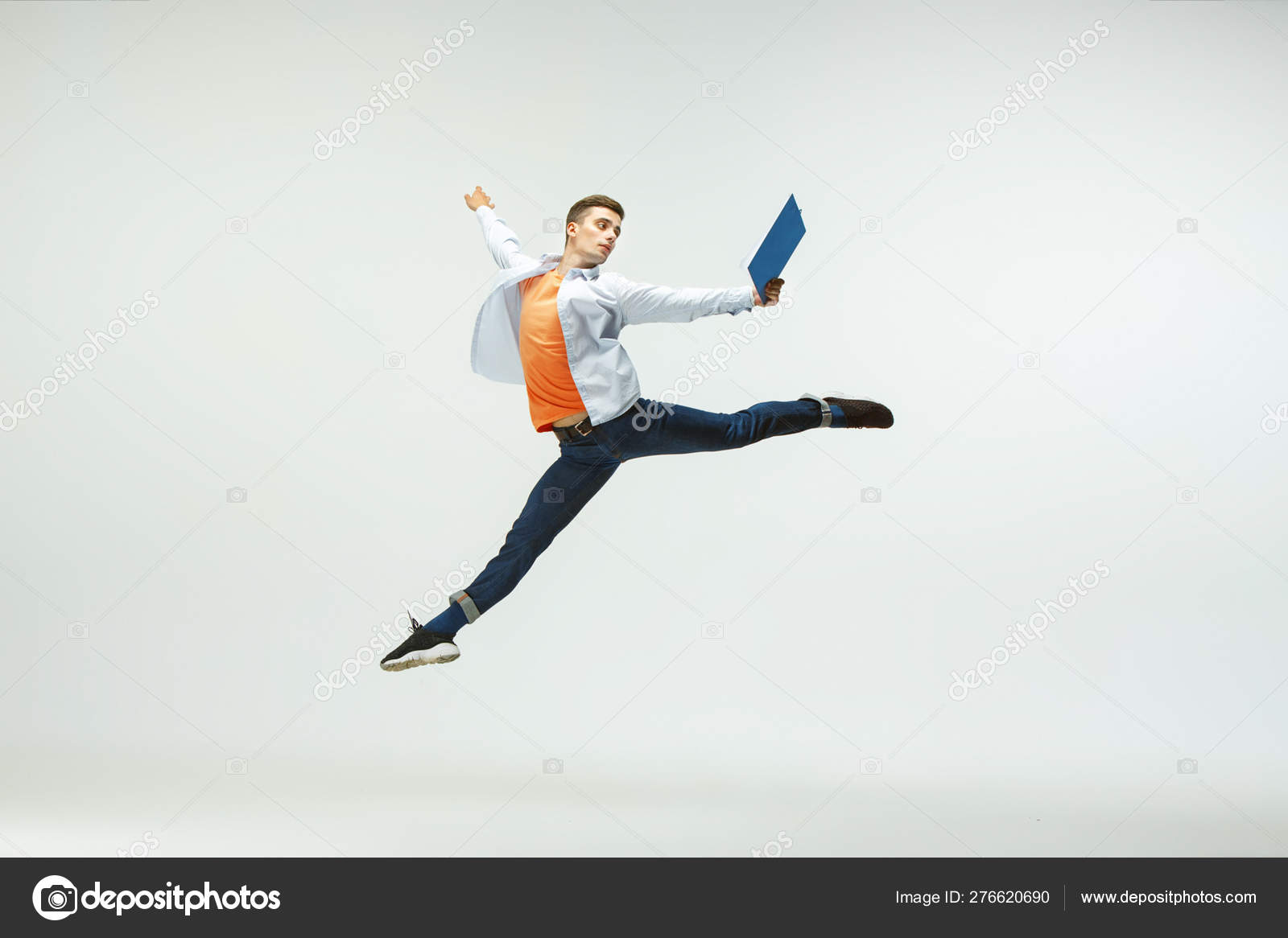 Office worker jumping isolated on white studio background Stock Photo ...